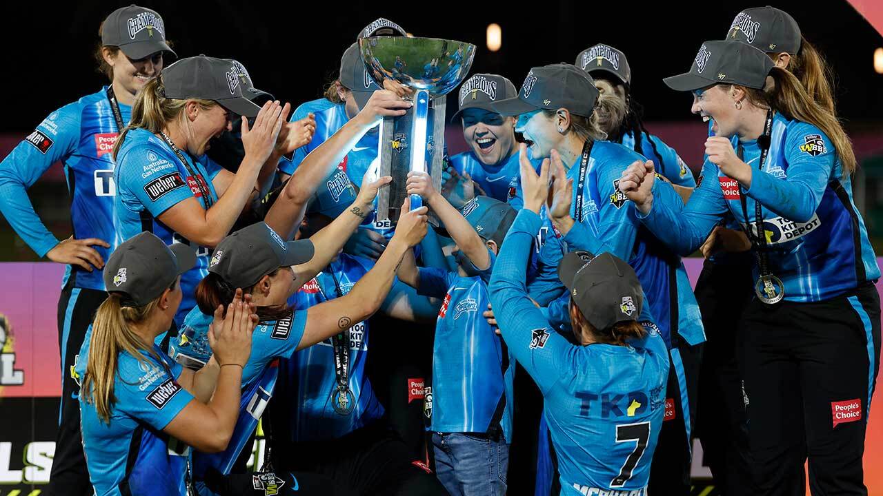 Party time! Strikers celebrate their first WBBL title