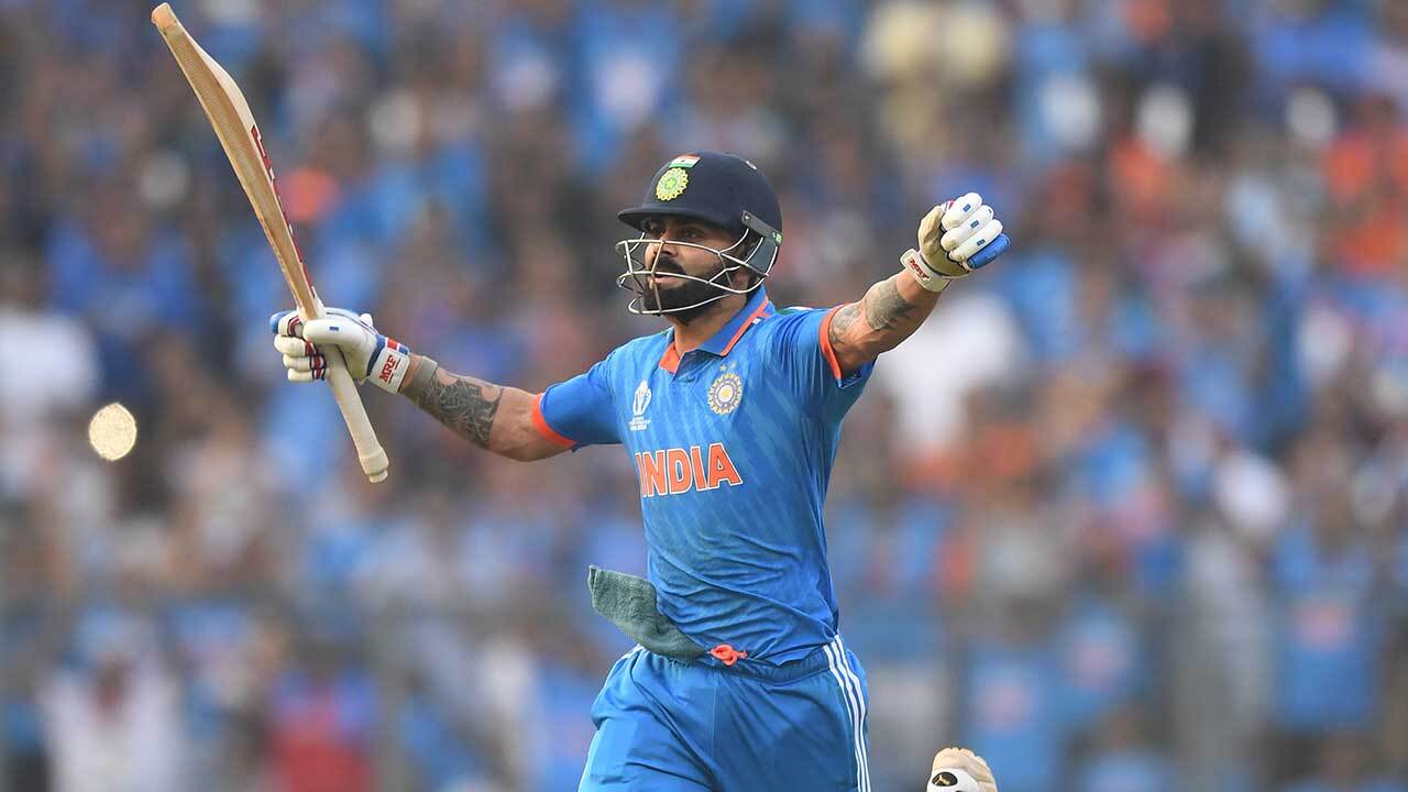 Kohli ton, Shami's seven put India into World Cup final